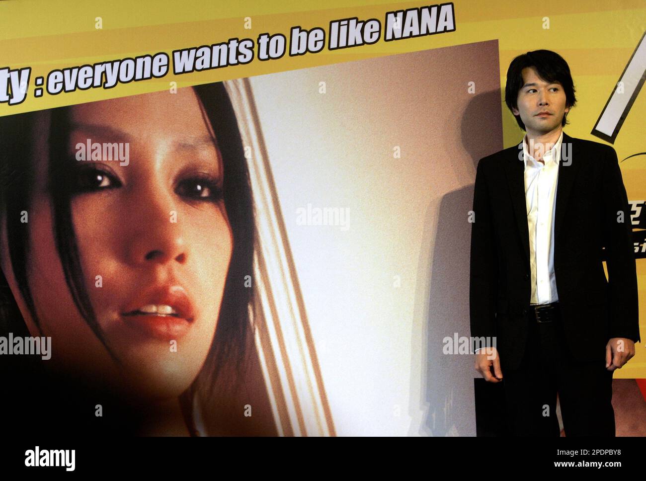 Japanese director Kentaro Otani poses for photographers after a press conference in Hong Kong ...