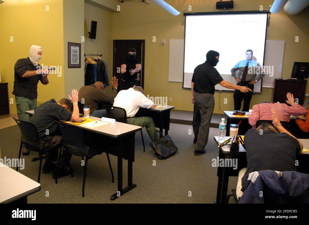 ** ADVANCE FOR MONDAY, OCT. 3 **Gunmen burst in during the early stages ...