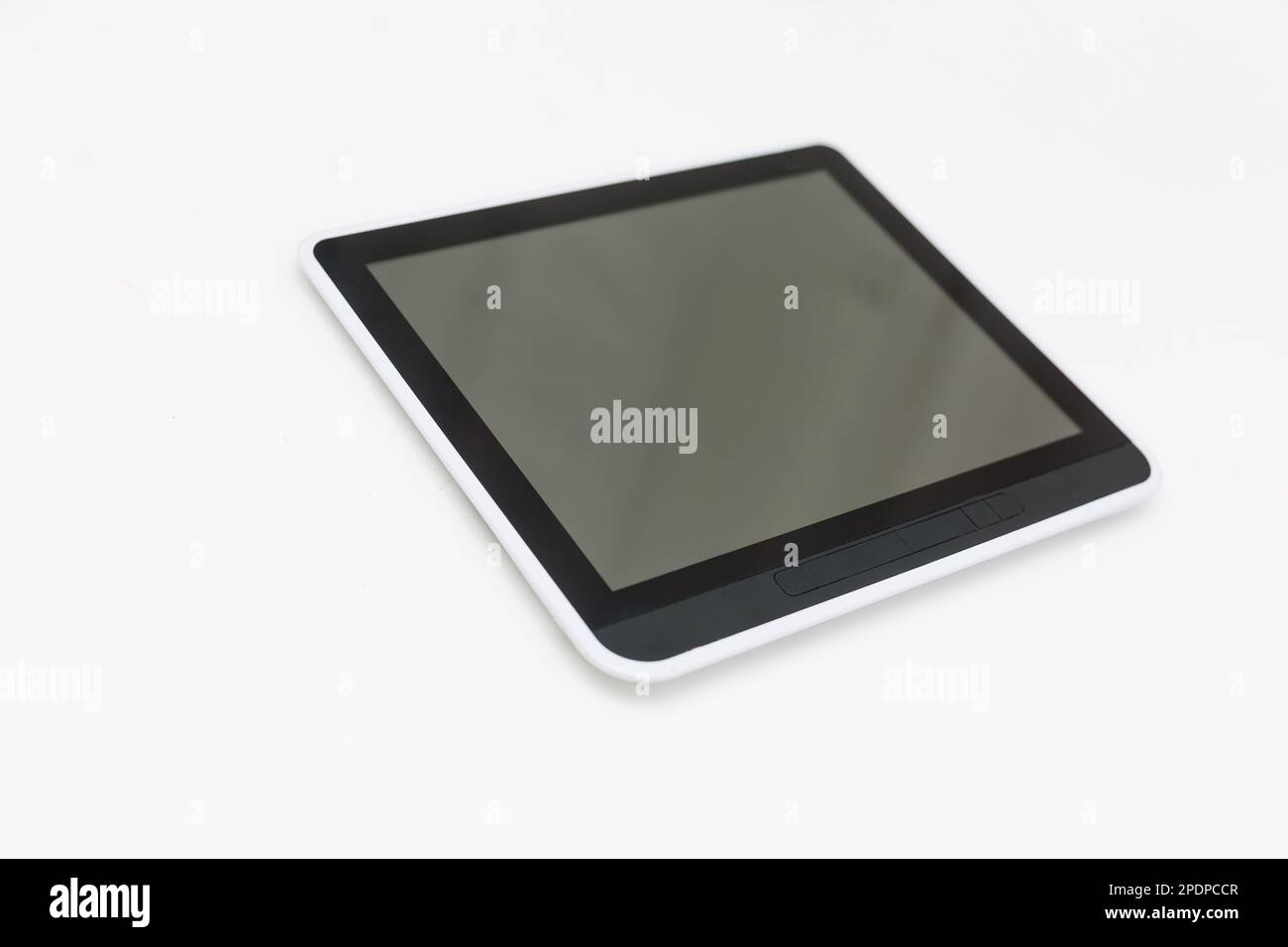 tablet computer with blank screen mockup lies on the surface, isolated ...