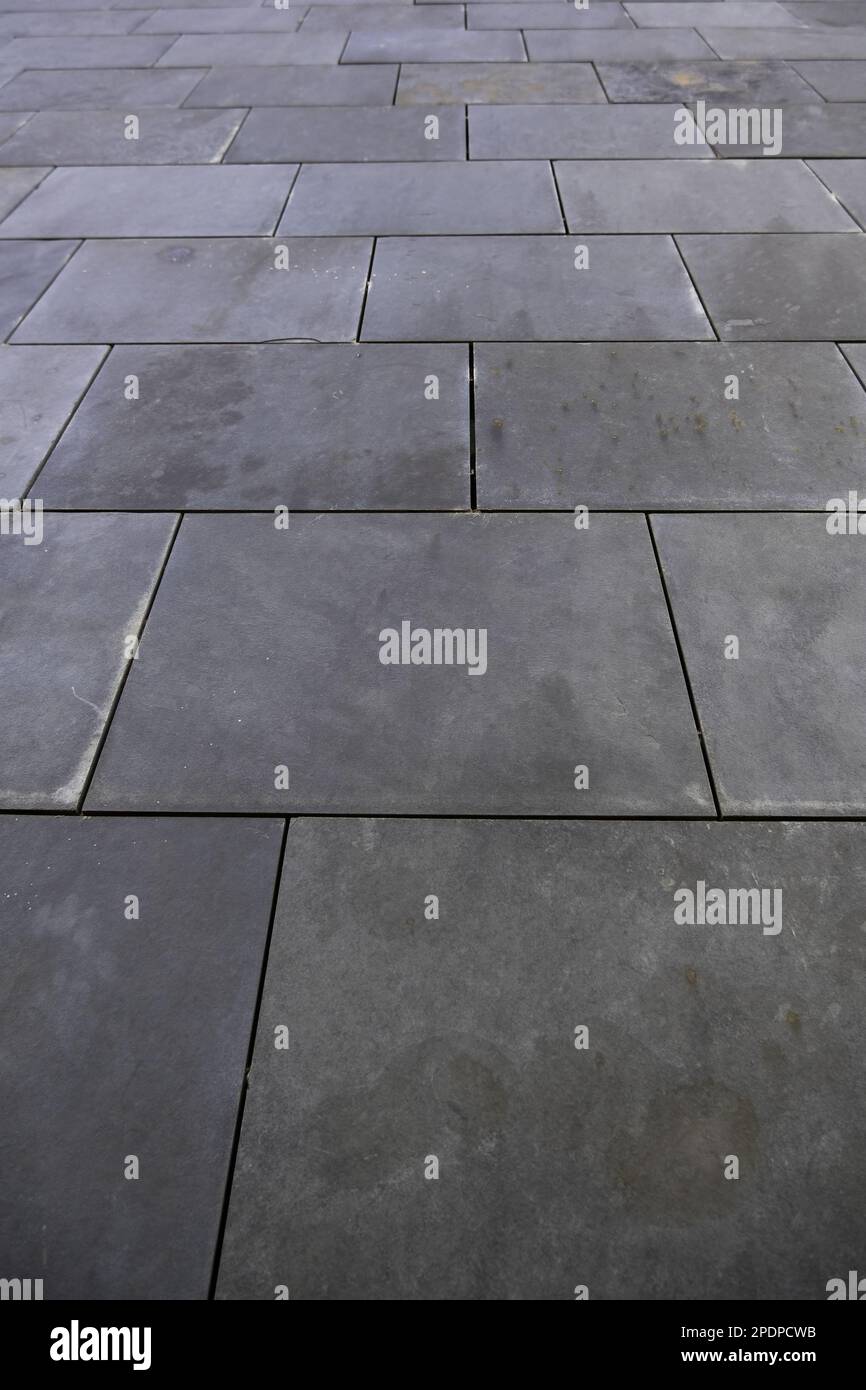 Detail of decorative slate tiles on an exterior wall Stock Photo - Alamy