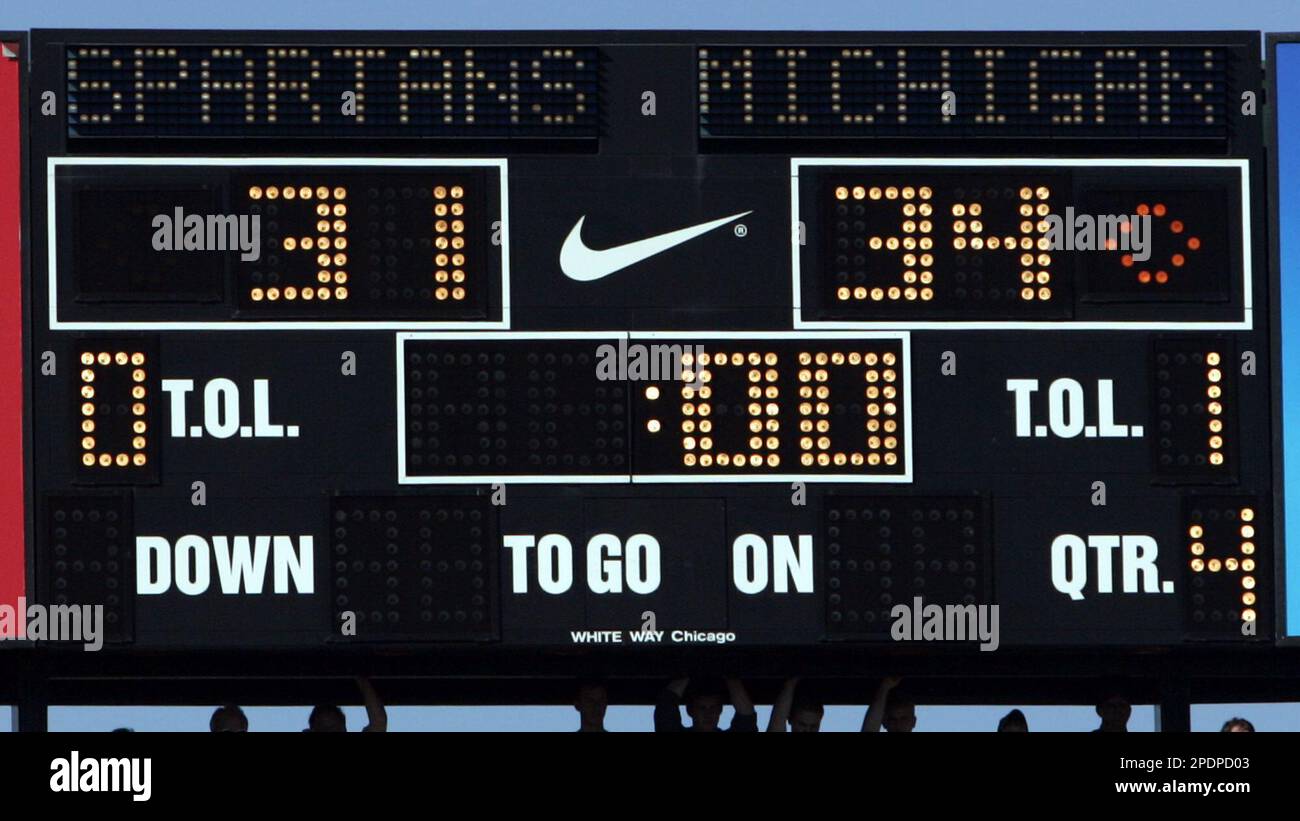 The finals score is shown on the scoreboard after Michigan defeated ...