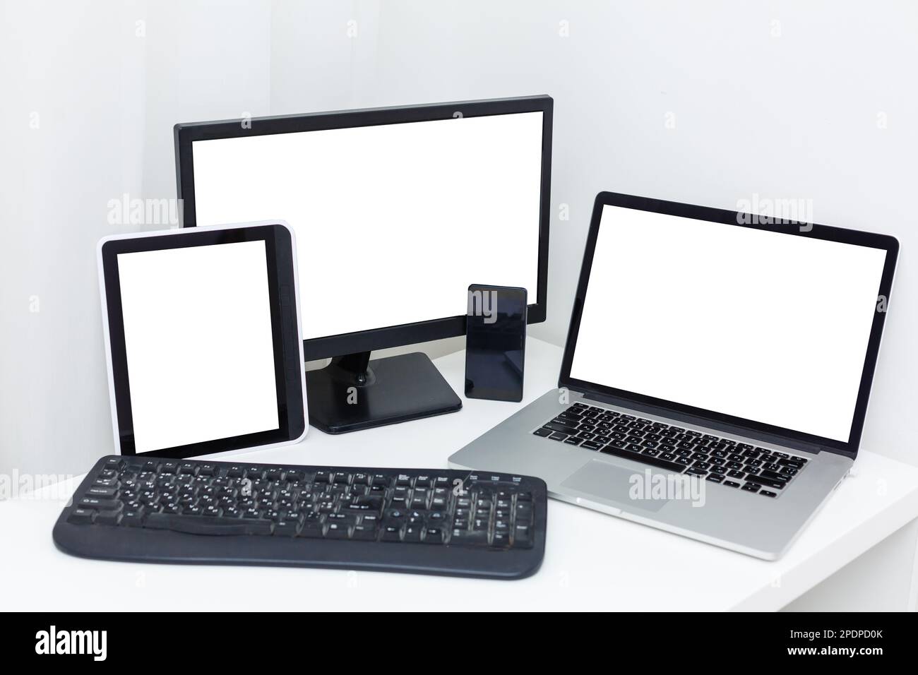 Computer monitor, laptop, tablet and mobile phone Stock Photo - Alamy