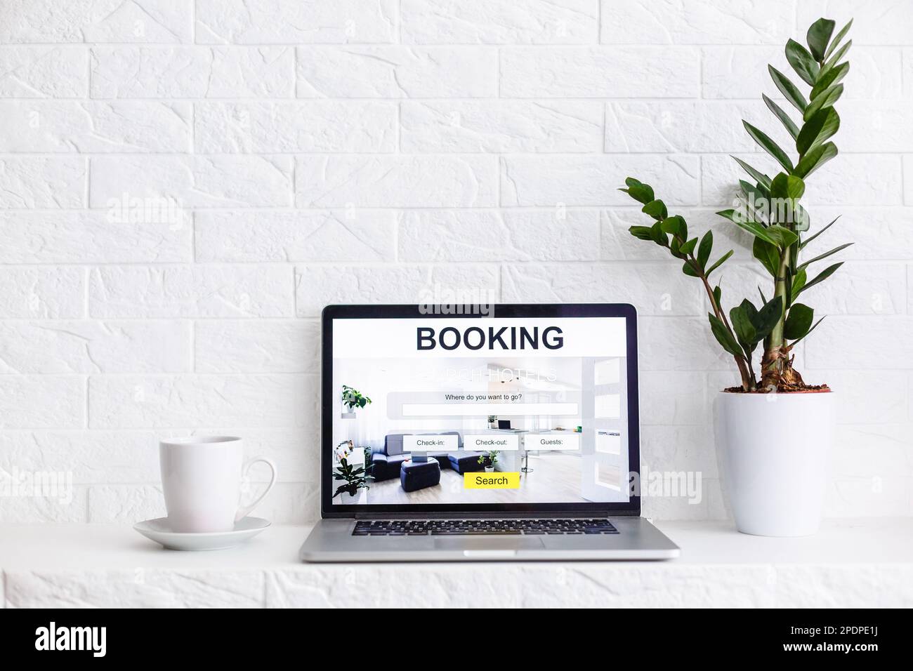 computer laptop with hotel booking screen on table in room Stock Photo ...