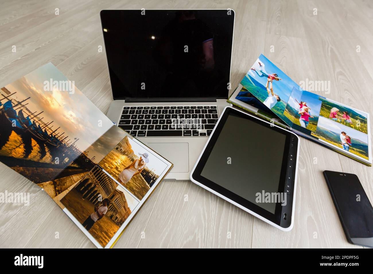laptop, computer, smartphone, photo book Stock Photo - Alamy