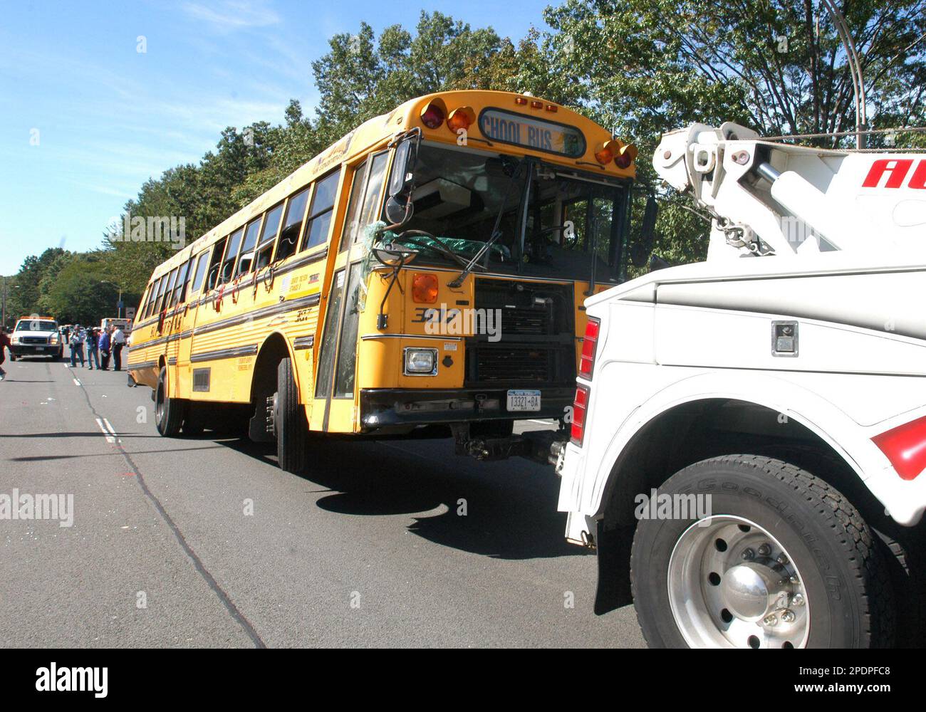 A school bus is towed following a collision with a car on the Major ...