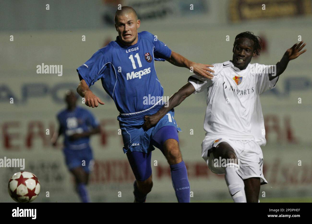 Papa Malik Ba of Basel challenges Domagoj Abramovic of Siroki Brijeg ...