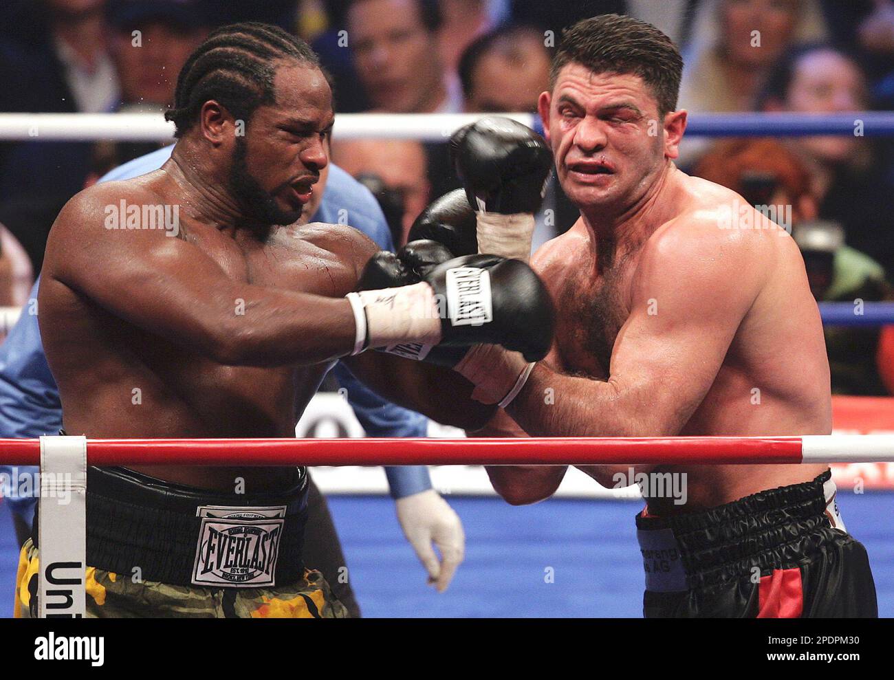 WBO heavyweight champion Lamon Brewster of the U.S., left, lands a punch during his World Boxing ...