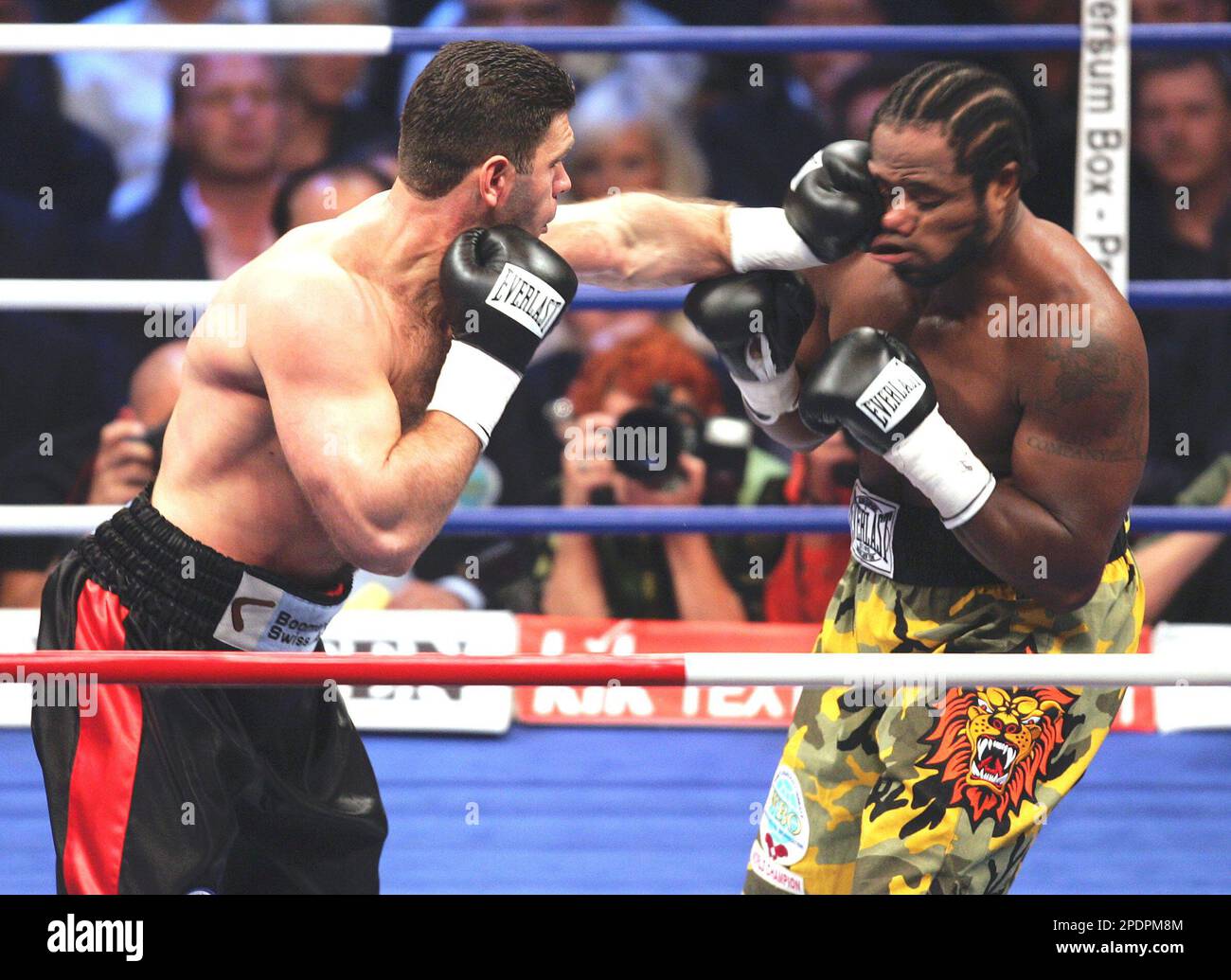 German boxer Luan Krasniqi, left, lands a punch during his World Boxing ...