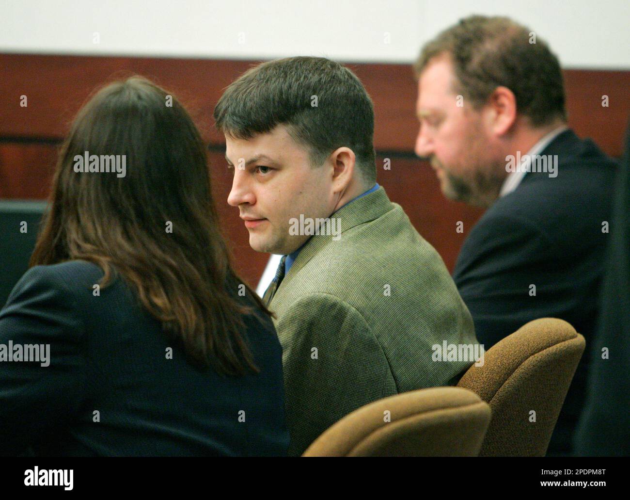 Benjamin Appleby, center, visits with defense attorneys Angela Keck ...