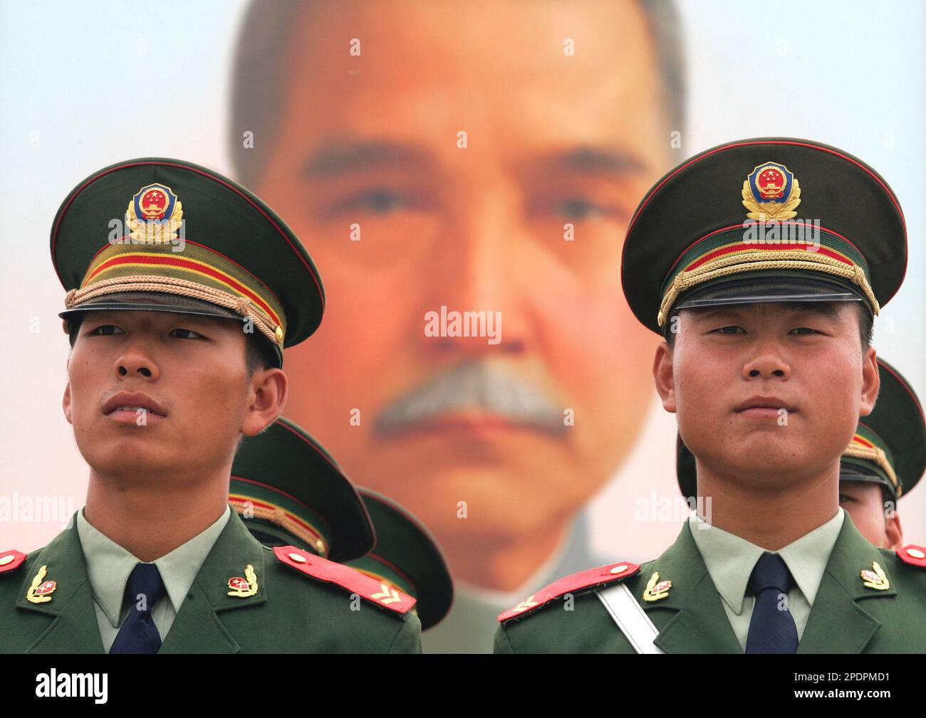Chinese paramilitary police officers prepare to patrol in Beijing's ...