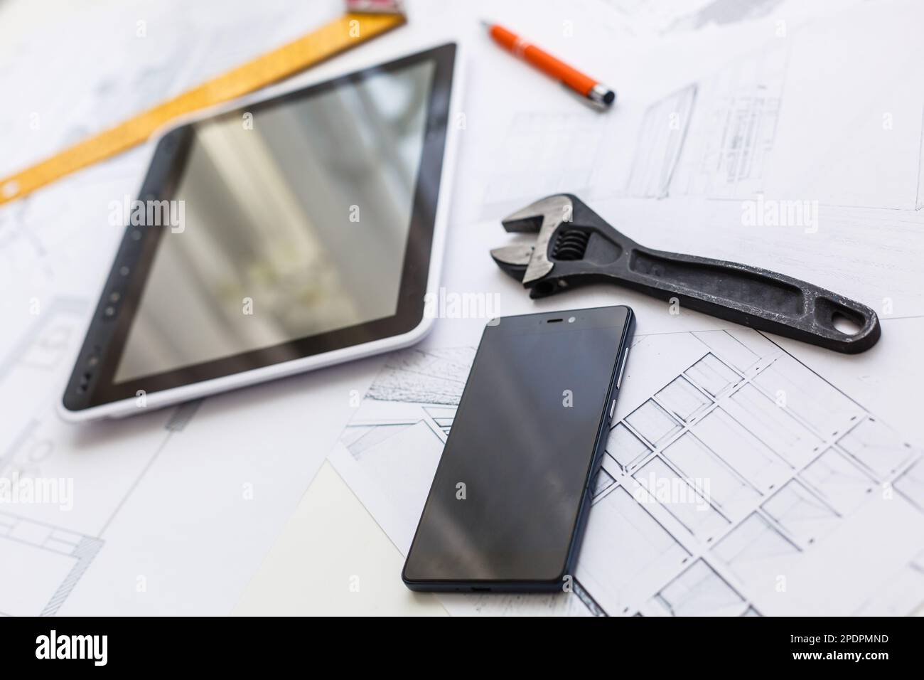 Construction blueprints with tools and tablet, top view Stock Photo - Alamy