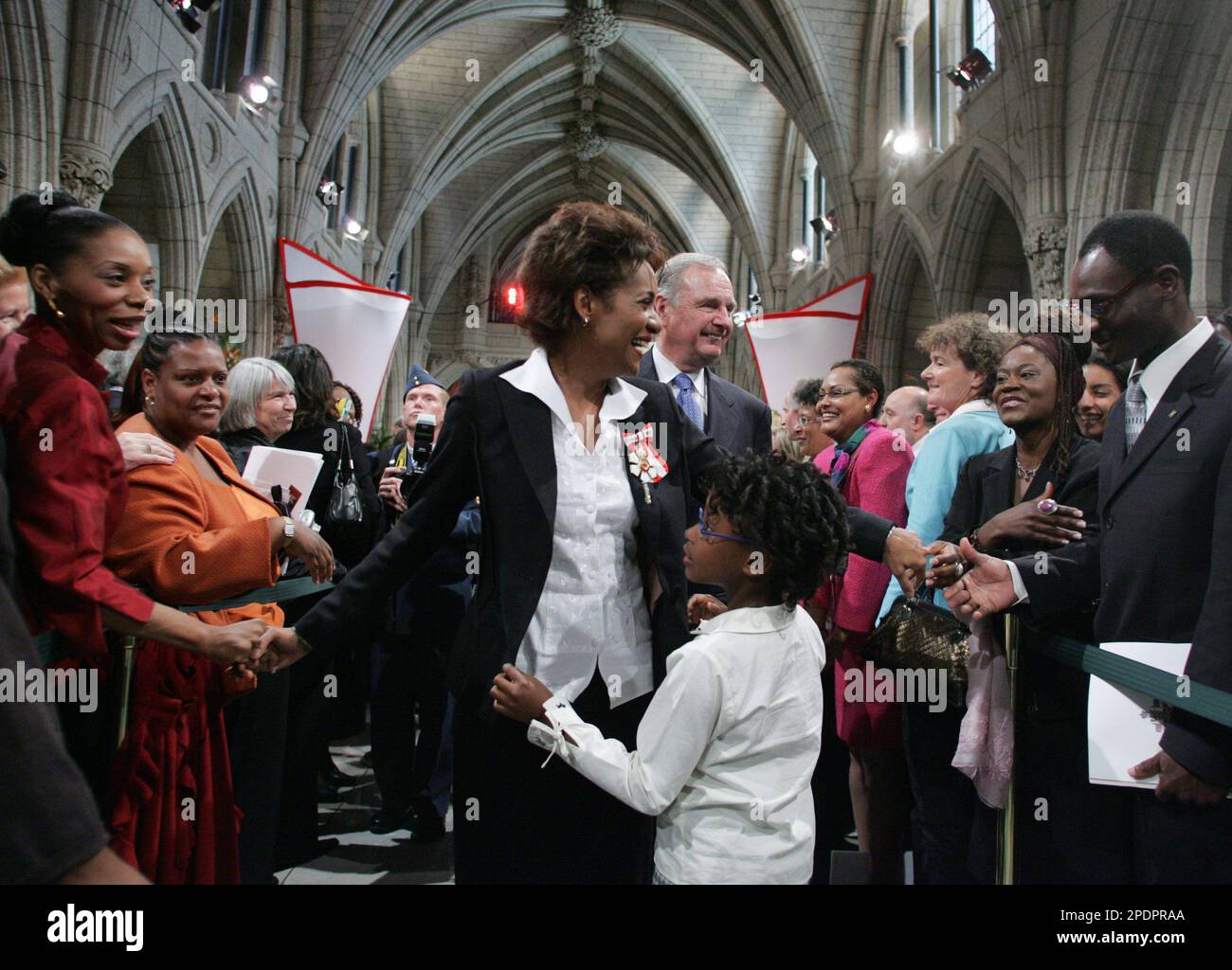 Newly sworn in Governor General Michaelle Jean, center, greets people ...