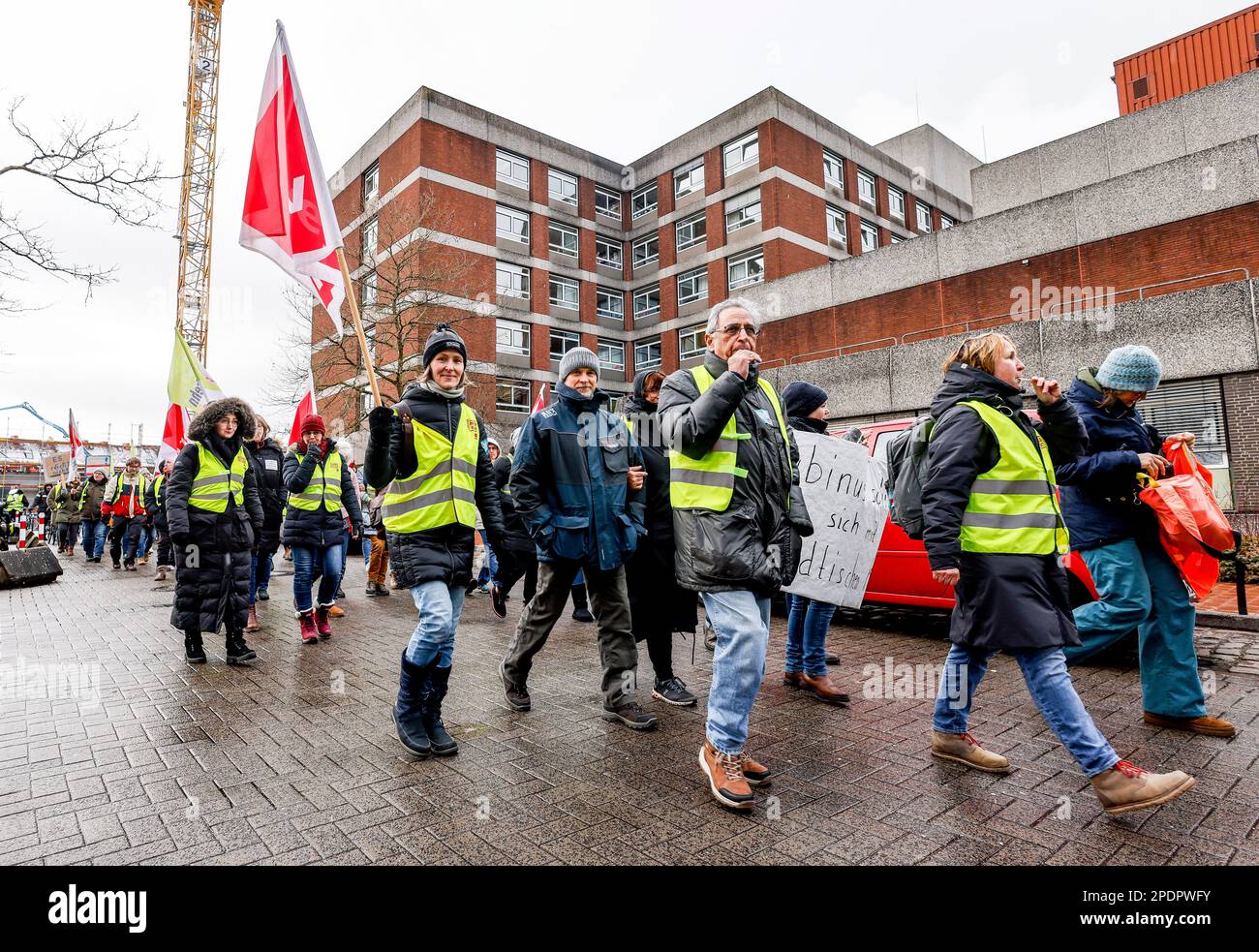 Kiel, Germany. 15th Mar, 2023. Employees of the Municipal Hospital walk ...