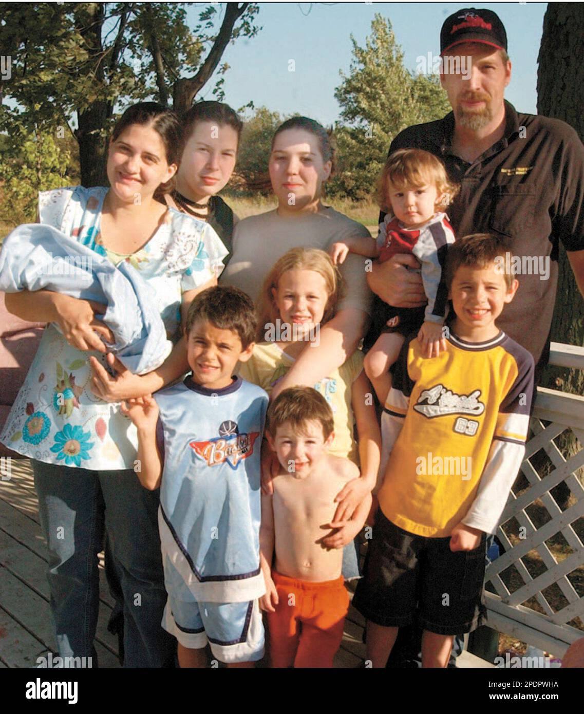 The Dennis family of Bush, La., Jill, holding Brendon, left, and ...