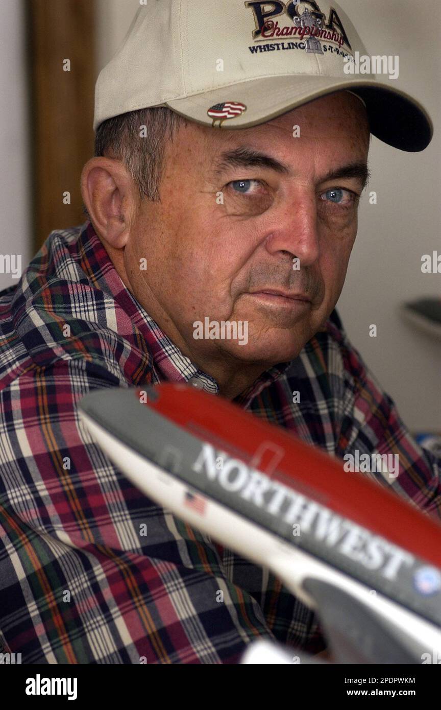 Les McNamee, who retired from Northwest Airlines in 2001, is surrounded ...