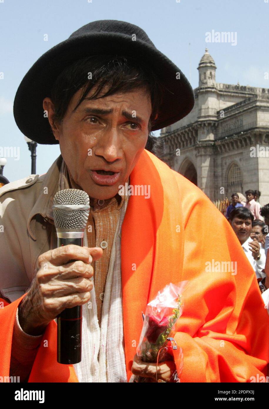 Bollywood actor Dev Anand speaks during the filming of his movie Mr ...