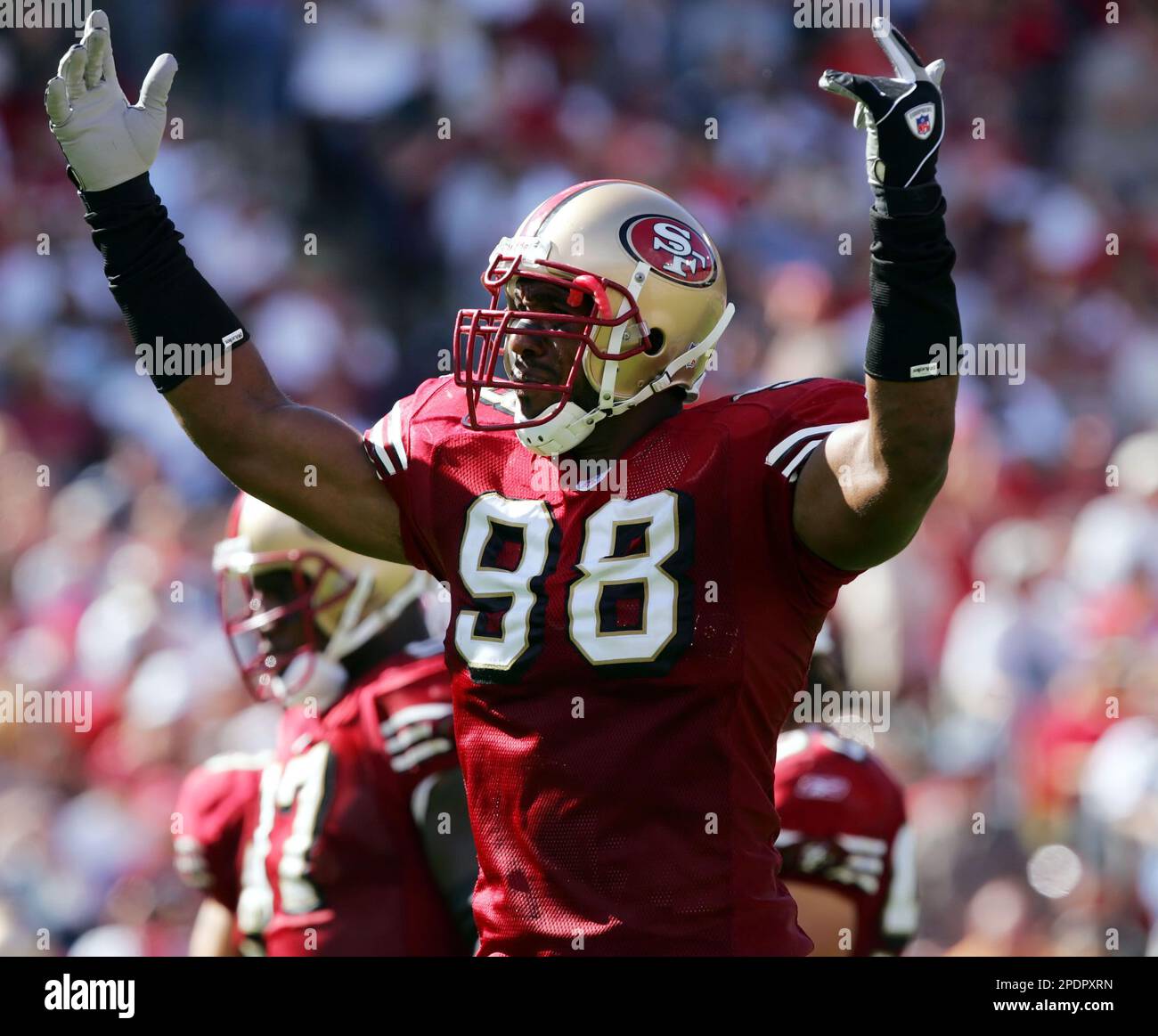 San Francisco 49ers linebacker Julian Peterson (98) rallies the crowd ...