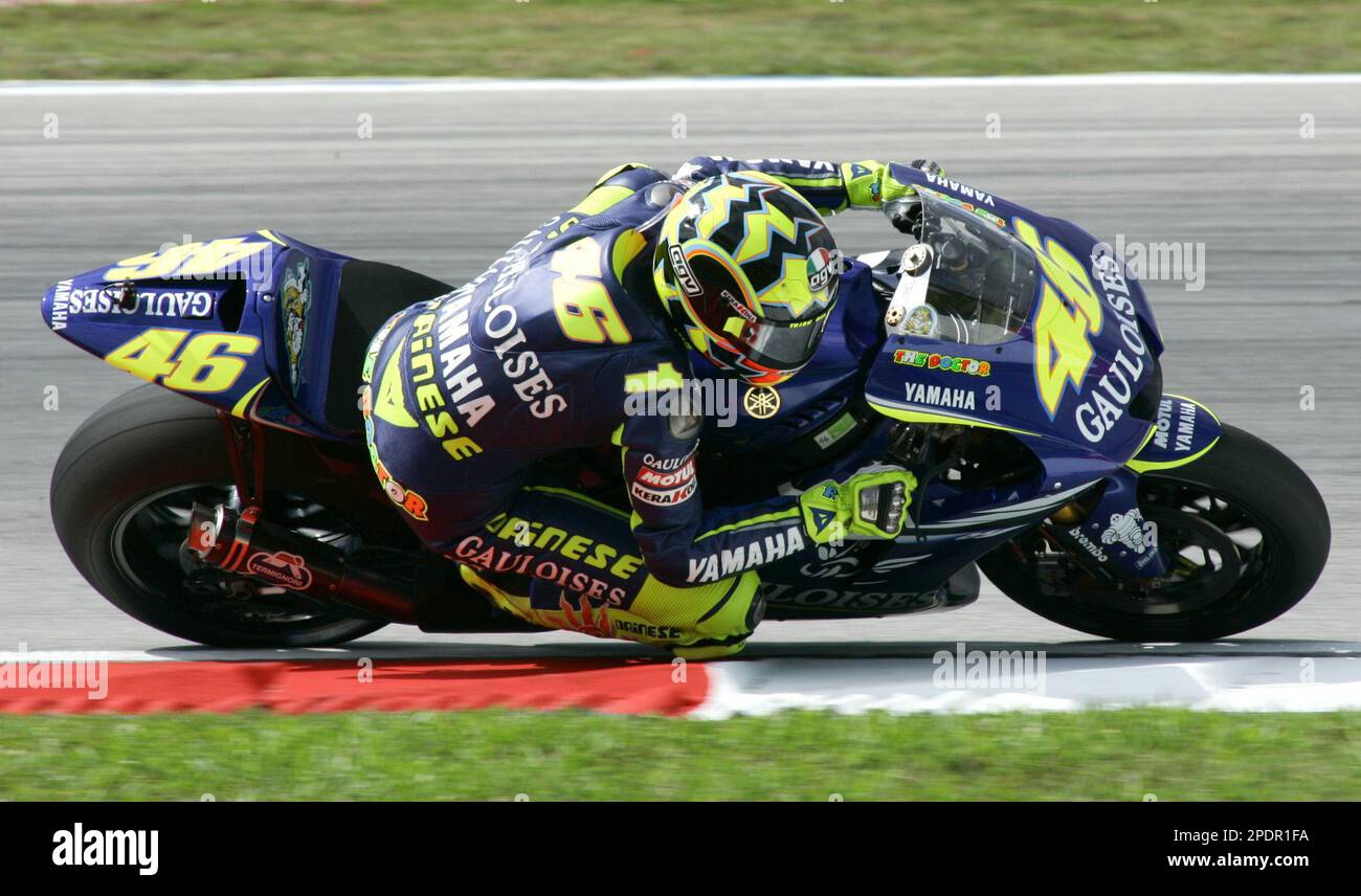 Italian MotoGP rider Valentino Rossi powers his Yamaha during MotoGP ...