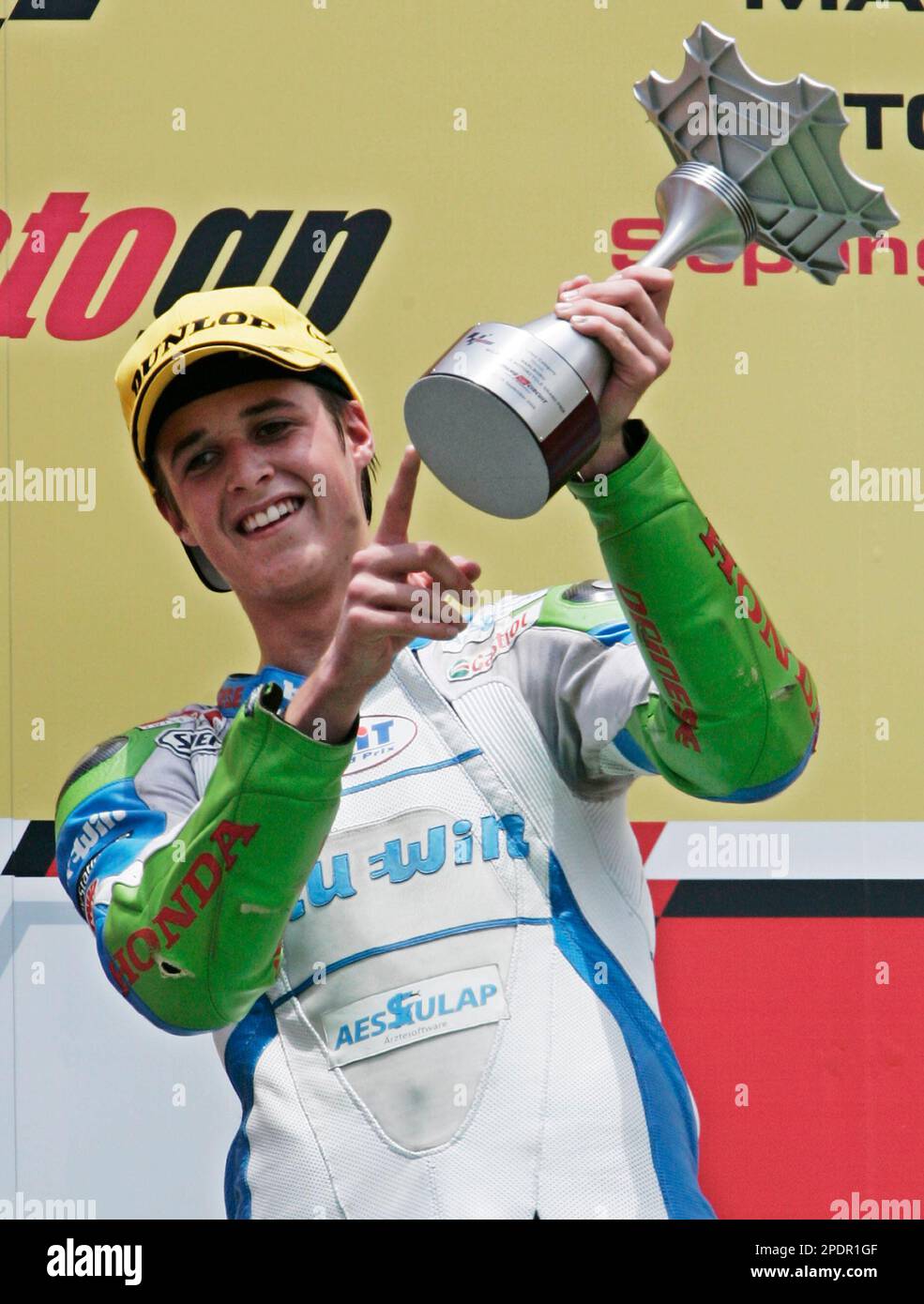 Switzerland's 125cc rider Thomas Luthi celebrates during the awarding ...