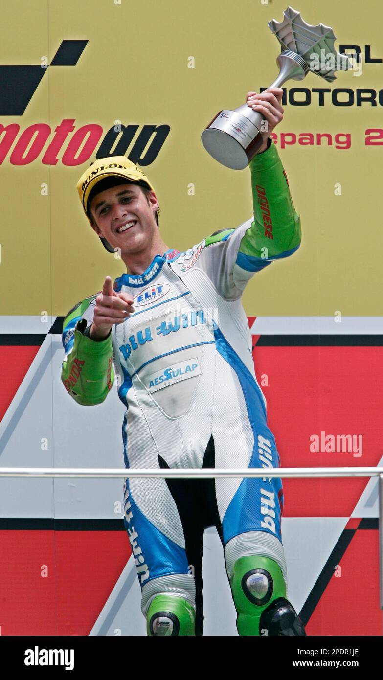 Switzerland's 125cc rider Thomas Luthi celebrates during the awarding ...