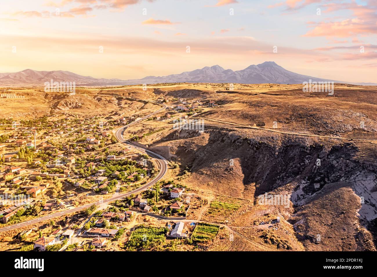 Aerial view of a village on a highland plateau in Cappadocia, with ...