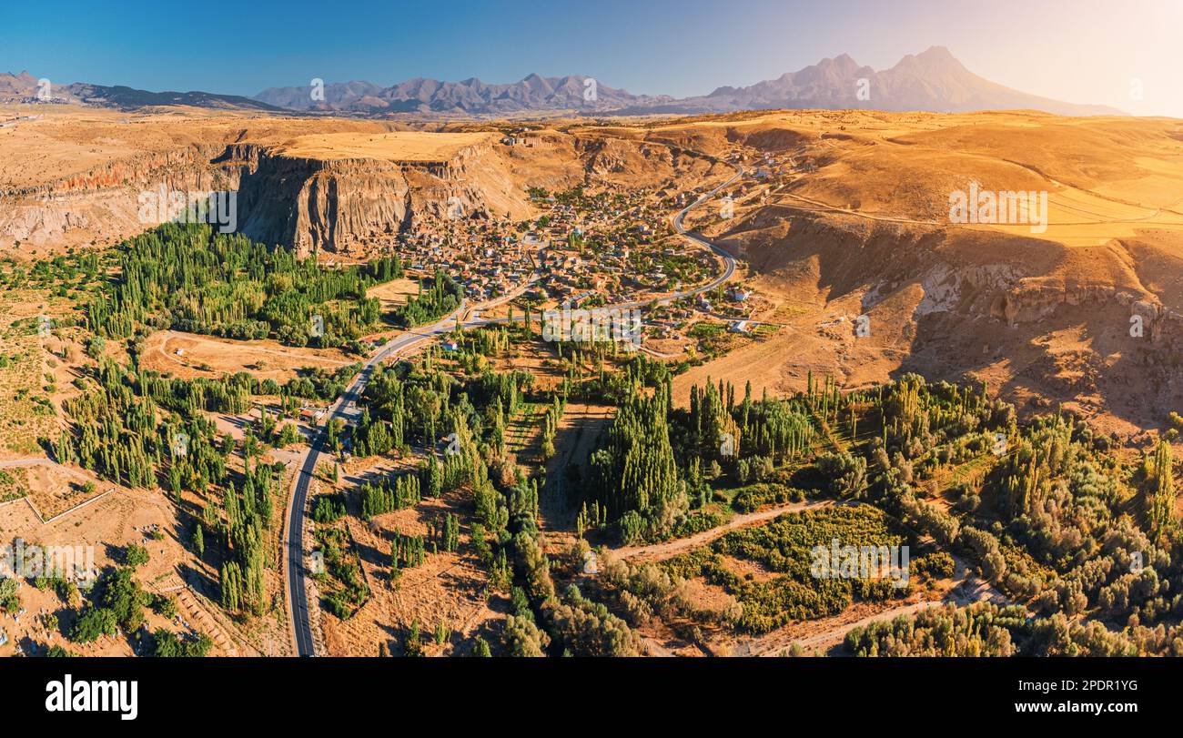 Aerial view of a village on a highland plateau in Cappadocia, with ...