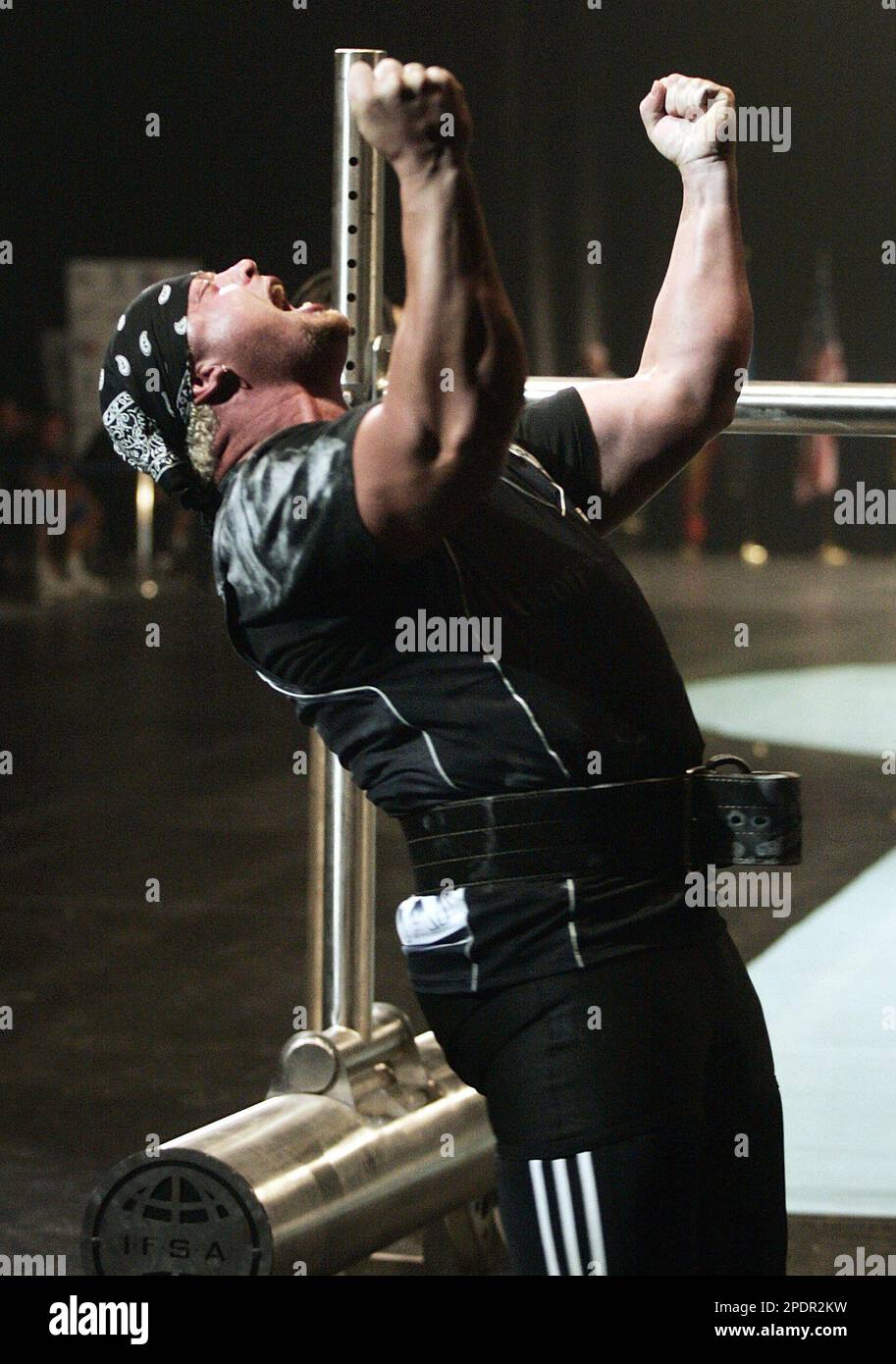 Canada's strongman Geoff Dolan reacts after carrying the 410kg ...