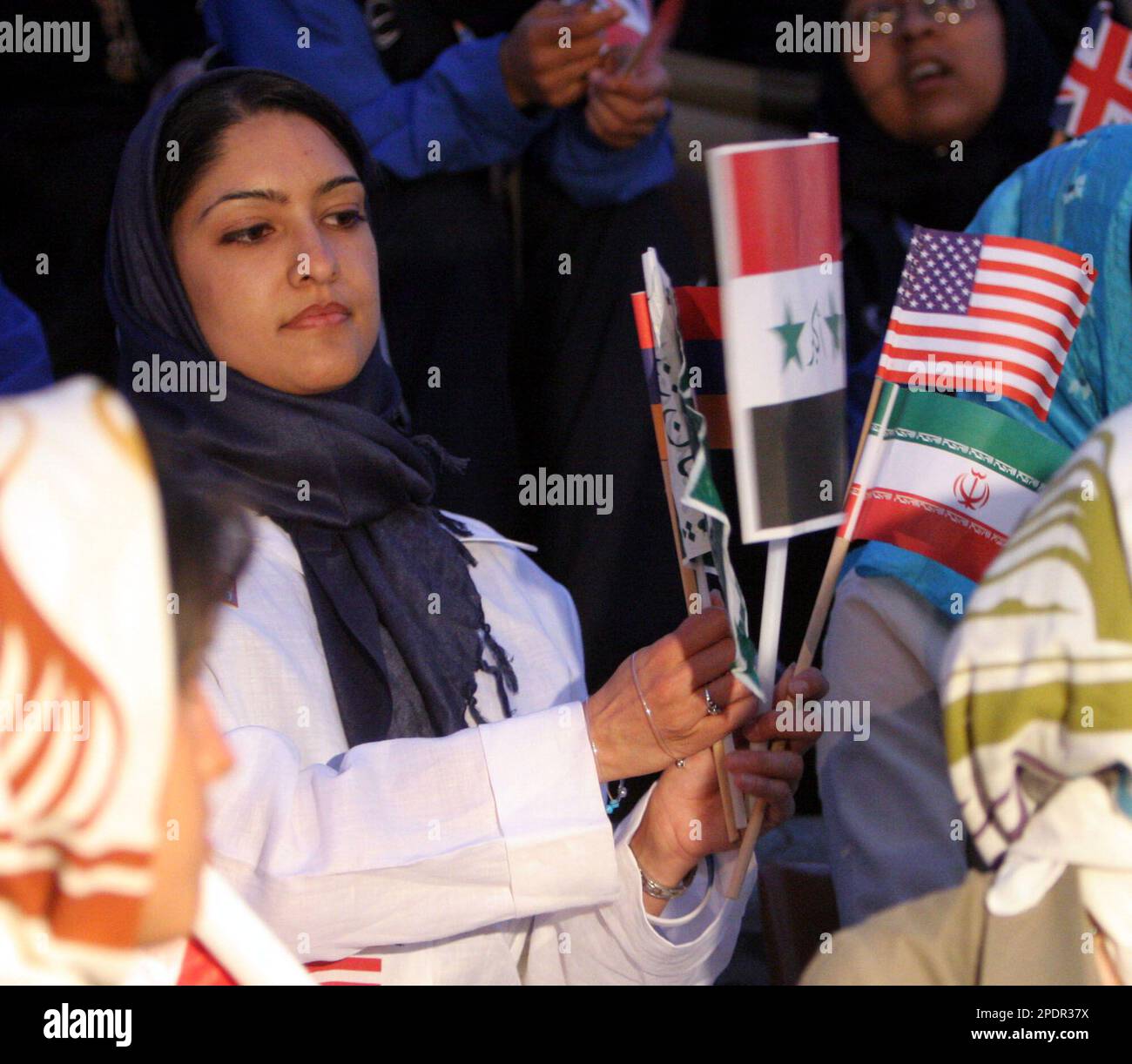 American-Pakistani athlete Sarah Kureshi,26, waves flags including ...