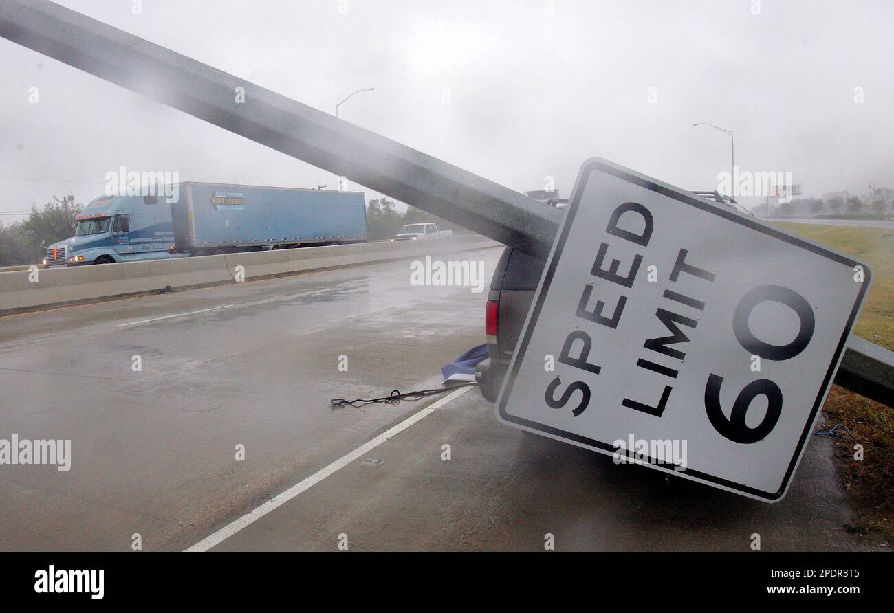 A downed speed limit sign frames a parked tractor trailer in Lake ... A downed speed limit sign frames a parked tractor trailer in Lake ...