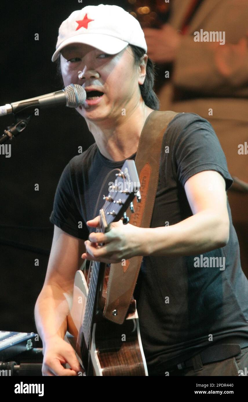Chinese rock singer Cui Jian performs at Beijing's Capital Stadium ...