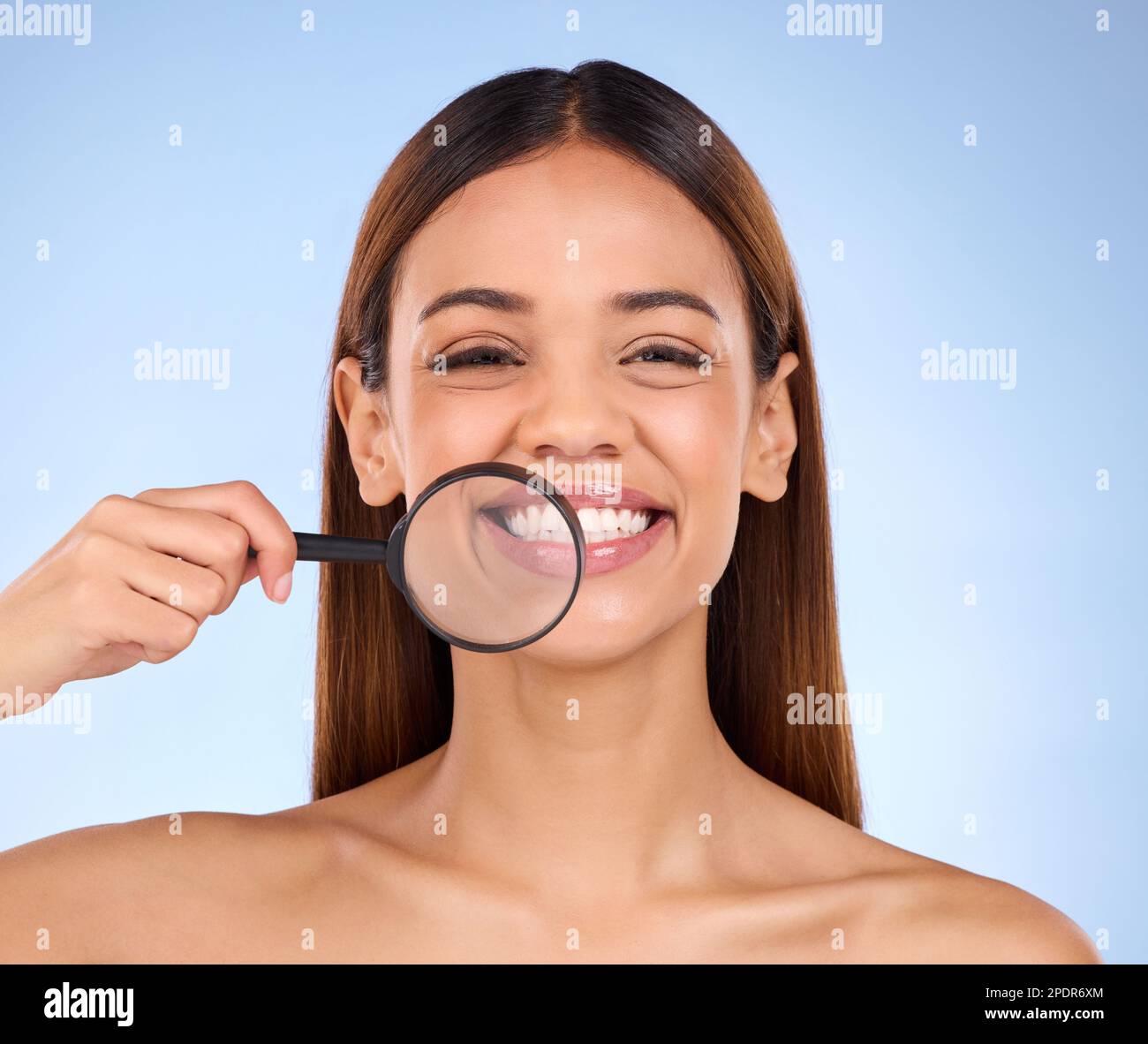 Magnifying glass, woman and portrait in studio for skincare analysis ...