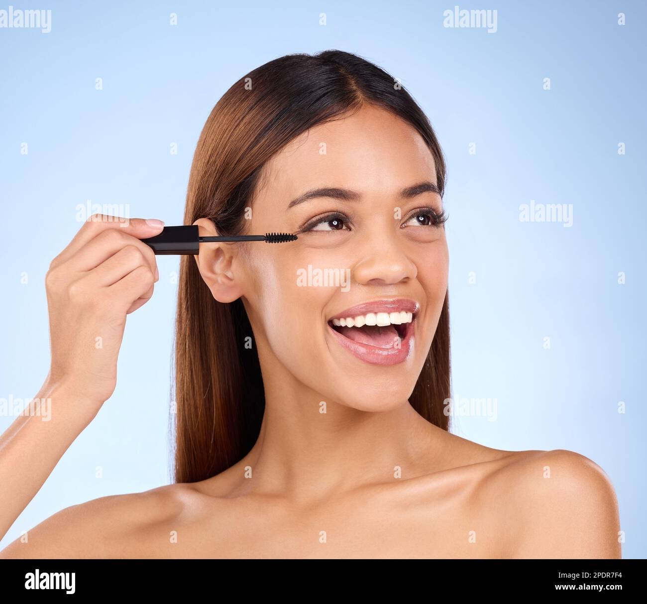 Beauty, mascara makeup and woman with cosmetics on face in studio ...