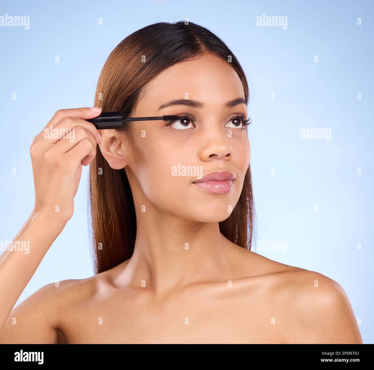 Beauty, woman and mascara makeup for eyes with cosmetics on face in ...