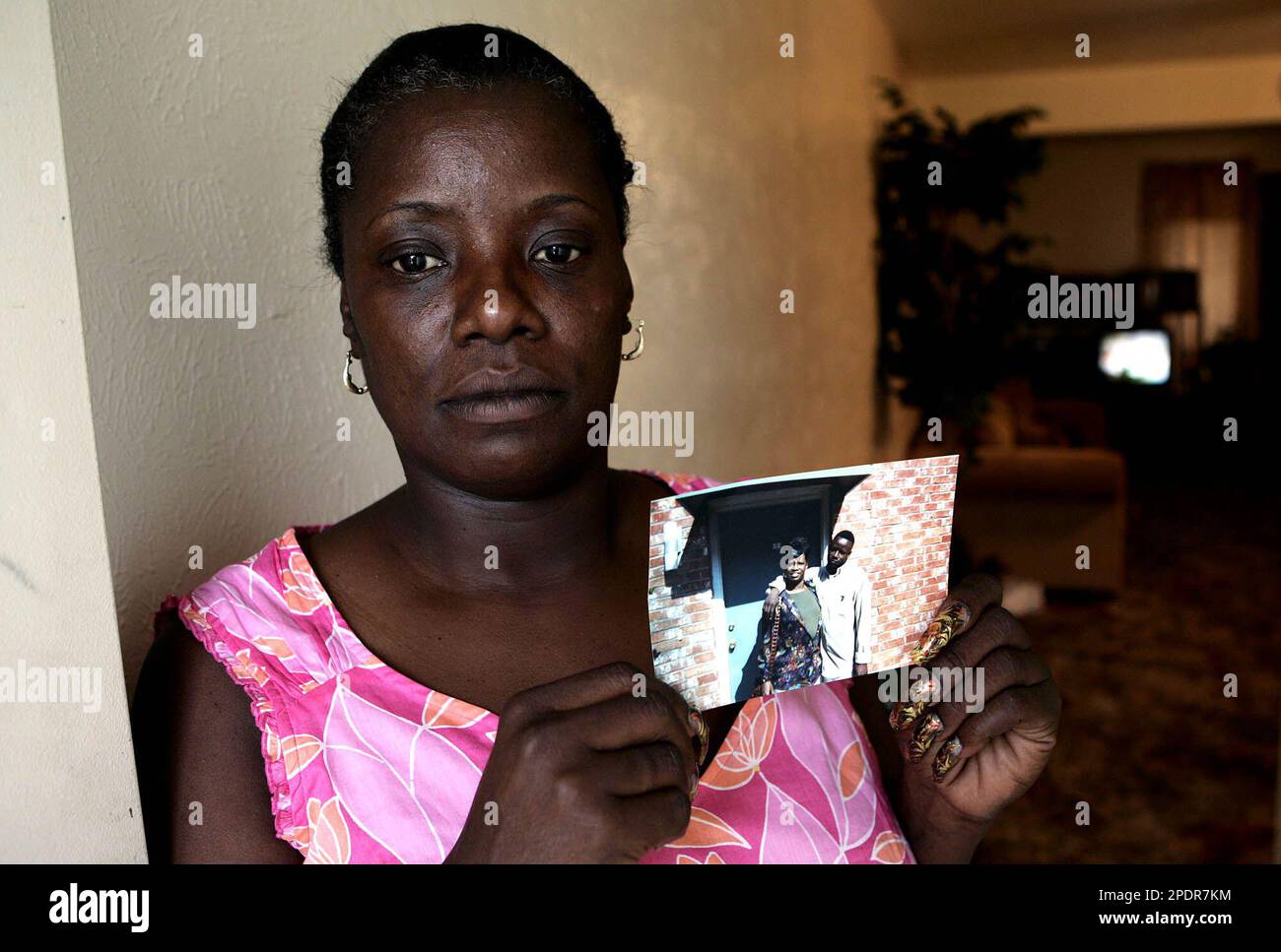 Sheila Airline holds a photo of her son slain Don Maurice at her home ...