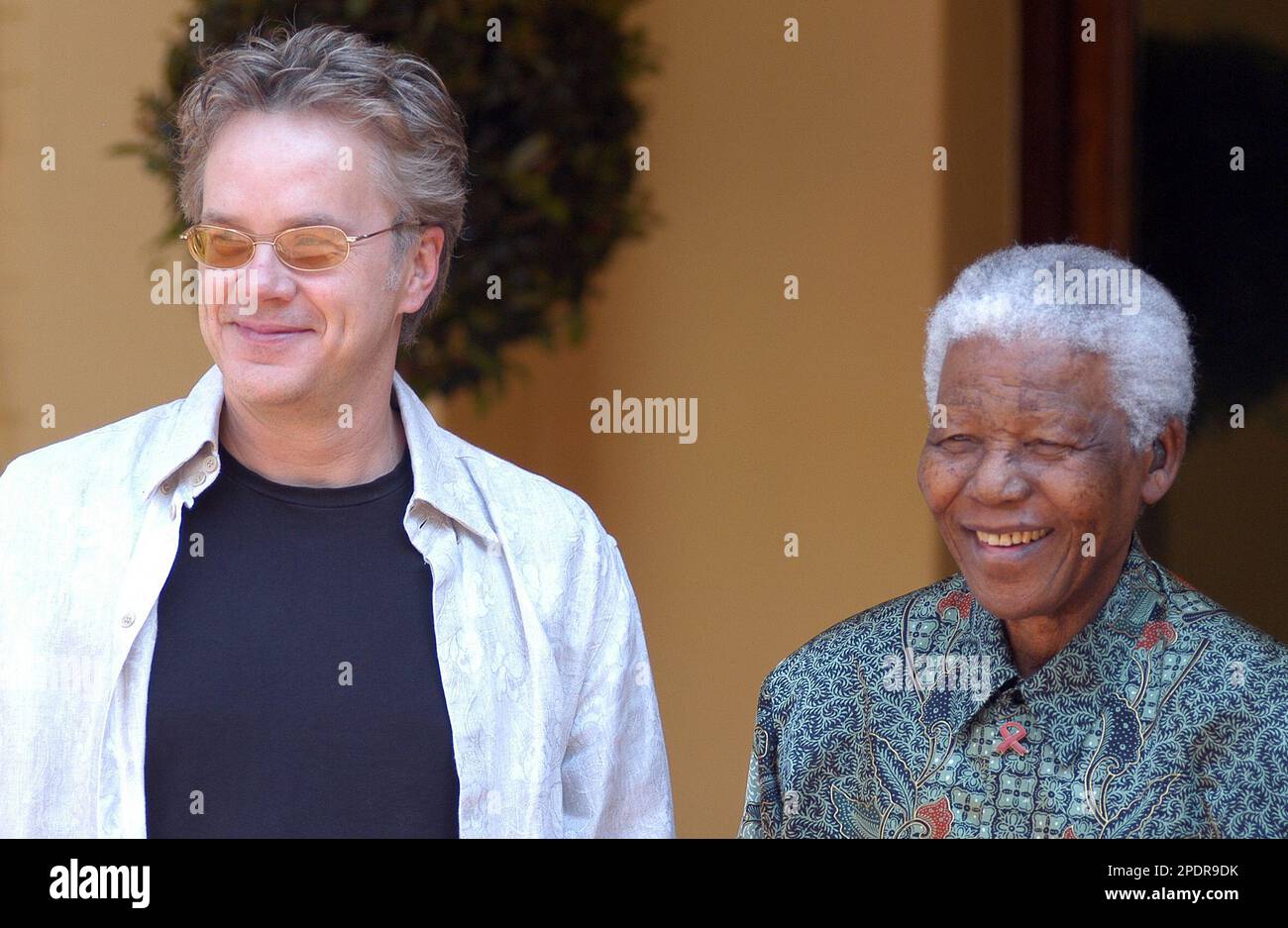 Former South African President, Nelson Mandela, right, with US film ...