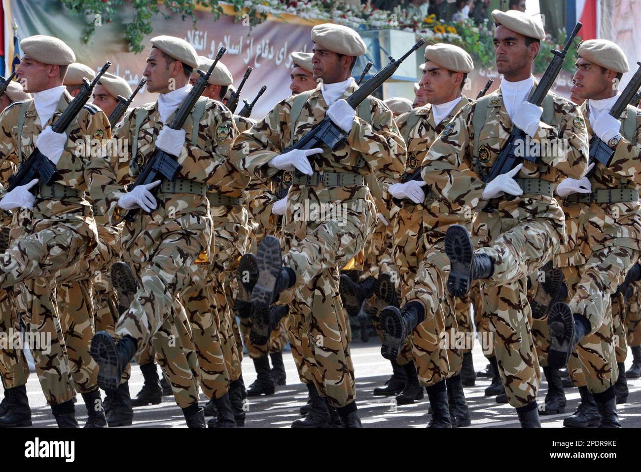 Iranian army soldiers march during a parade ceremony marking 25th ...