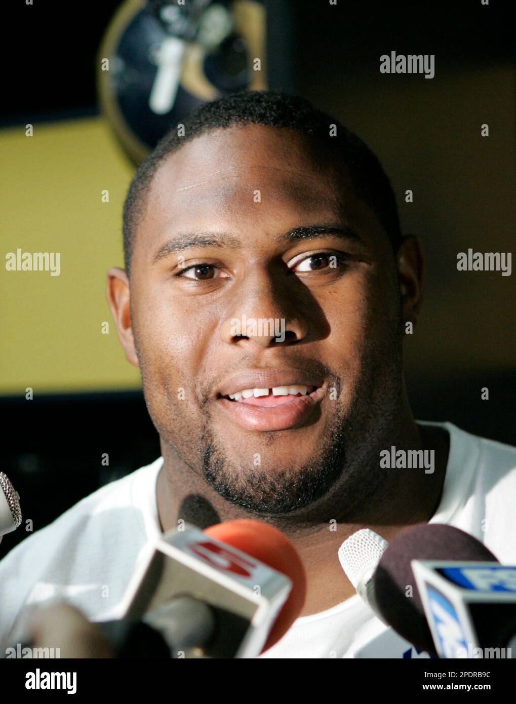 St. Louis Rams offensive lineman Damione Lewis talks at the team's ...