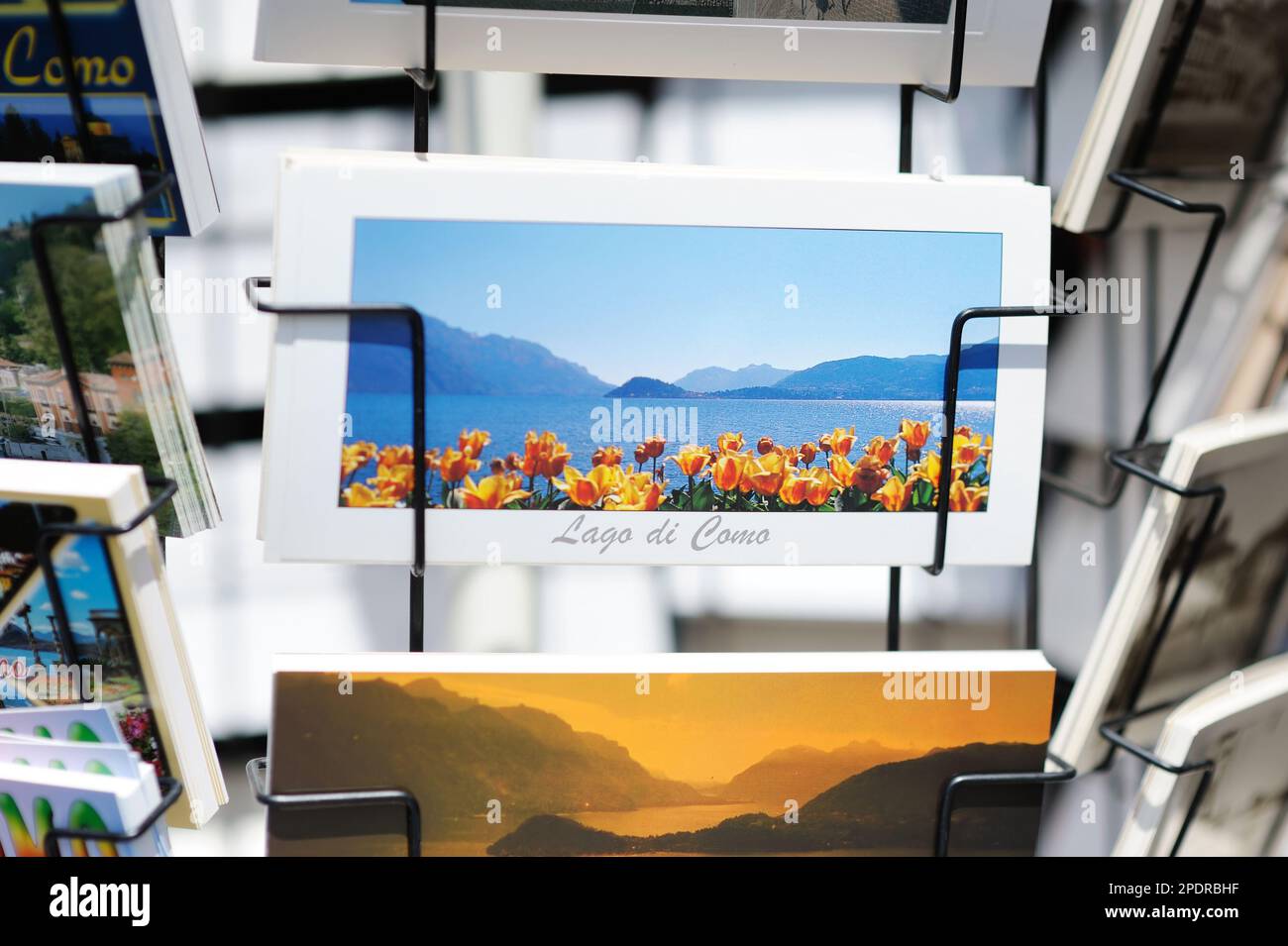 COMO, ITALY - MAY 2011: Various postcards from Como town displayed at ...