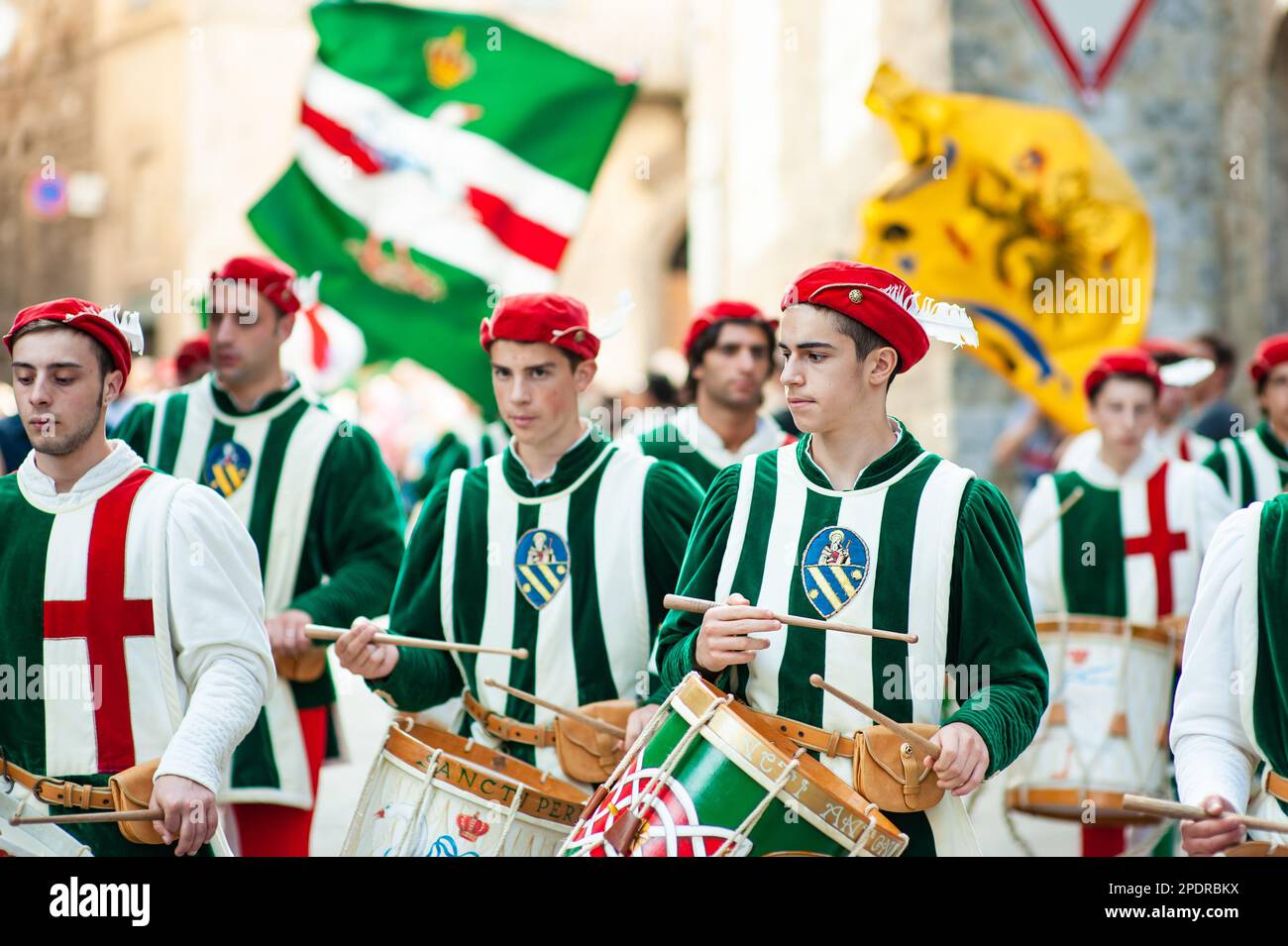 SIENA, ITALY - JULY 2013: Members of the noble Contrada dell'Oca ...