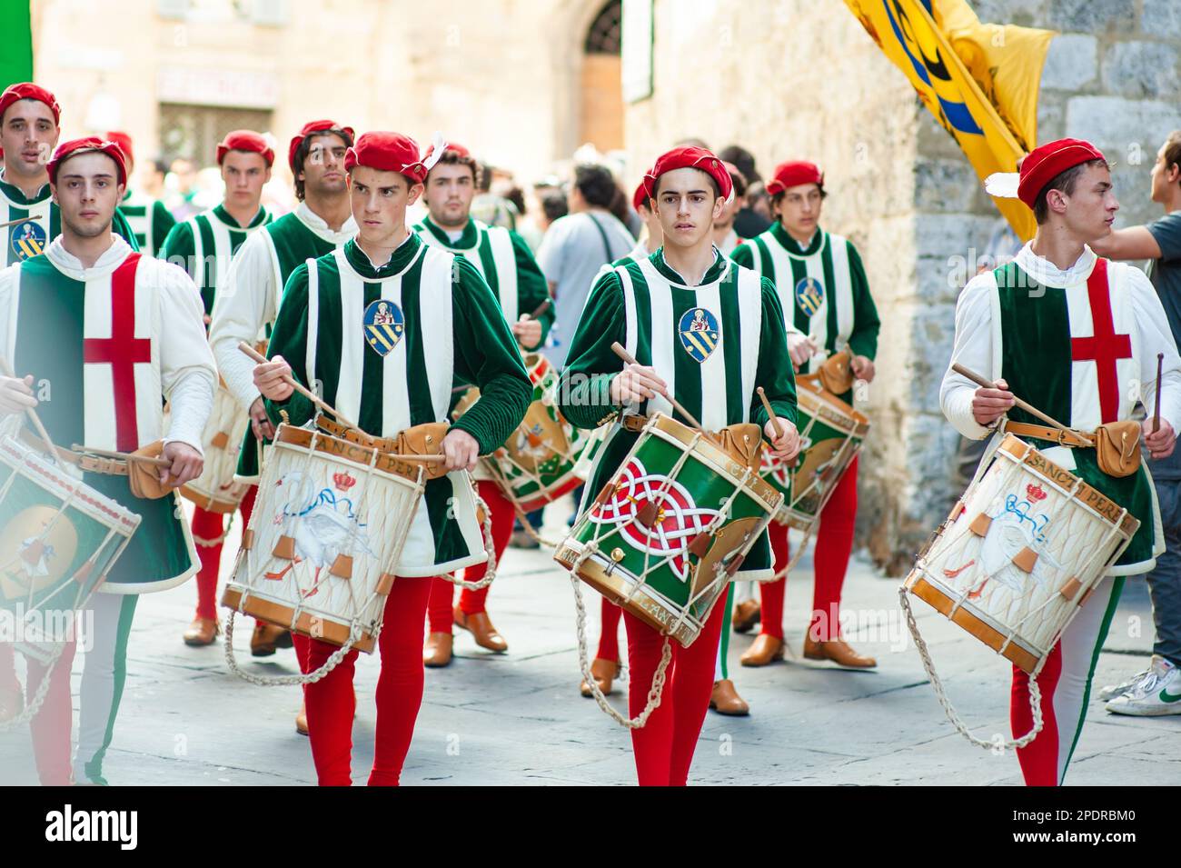 SIENA, ITALY - JULY 2013: Members of the noble Contrada dell'Oca ...