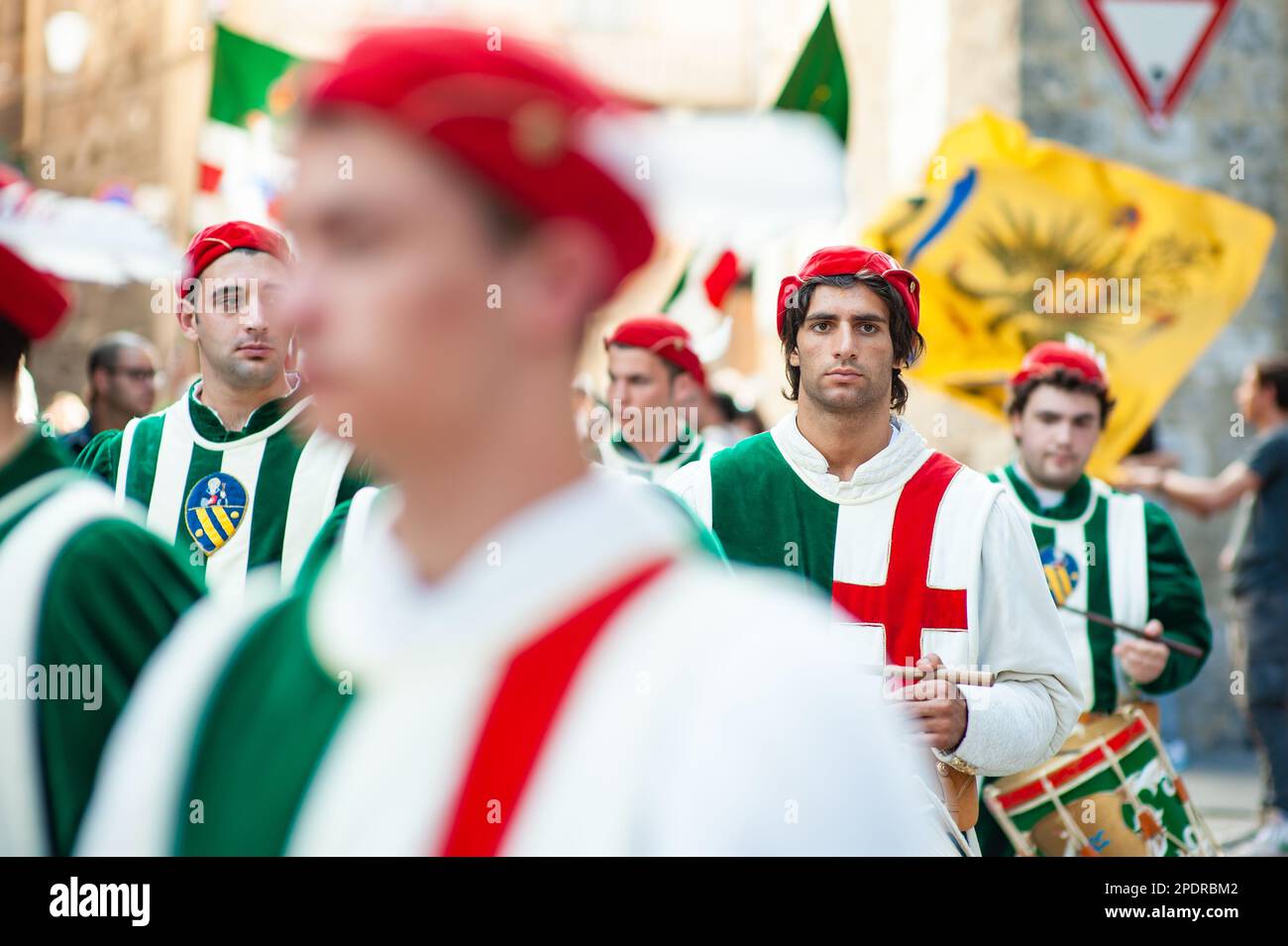 SIENA, ITALY - JULY 2013: Members of the noble Contrada dell'Oca ...