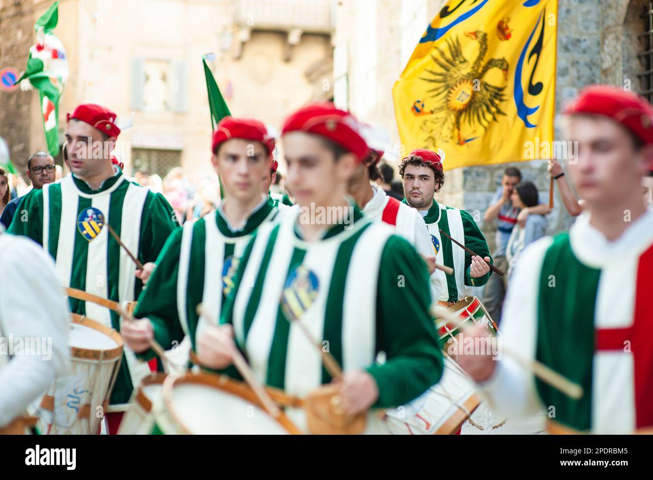 SIENA, ITALY - JULY 2013: Members of the noble Contrada dell'Oca ...