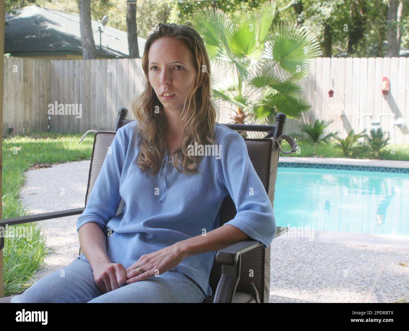 Deleese Williams sits by the pool at her house in Conroe, Texas ...