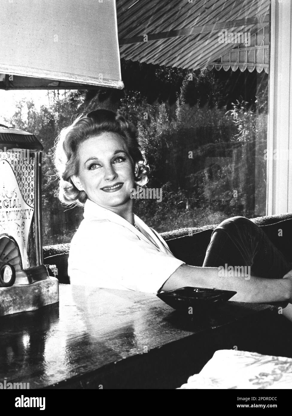 ** FILE ** Constance Moore sits by a picture window in her Beverly ...