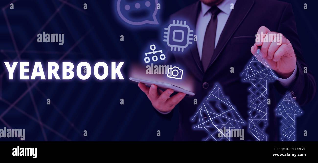 Sign displaying Yearbook. Word for publication compiled by graduating ...