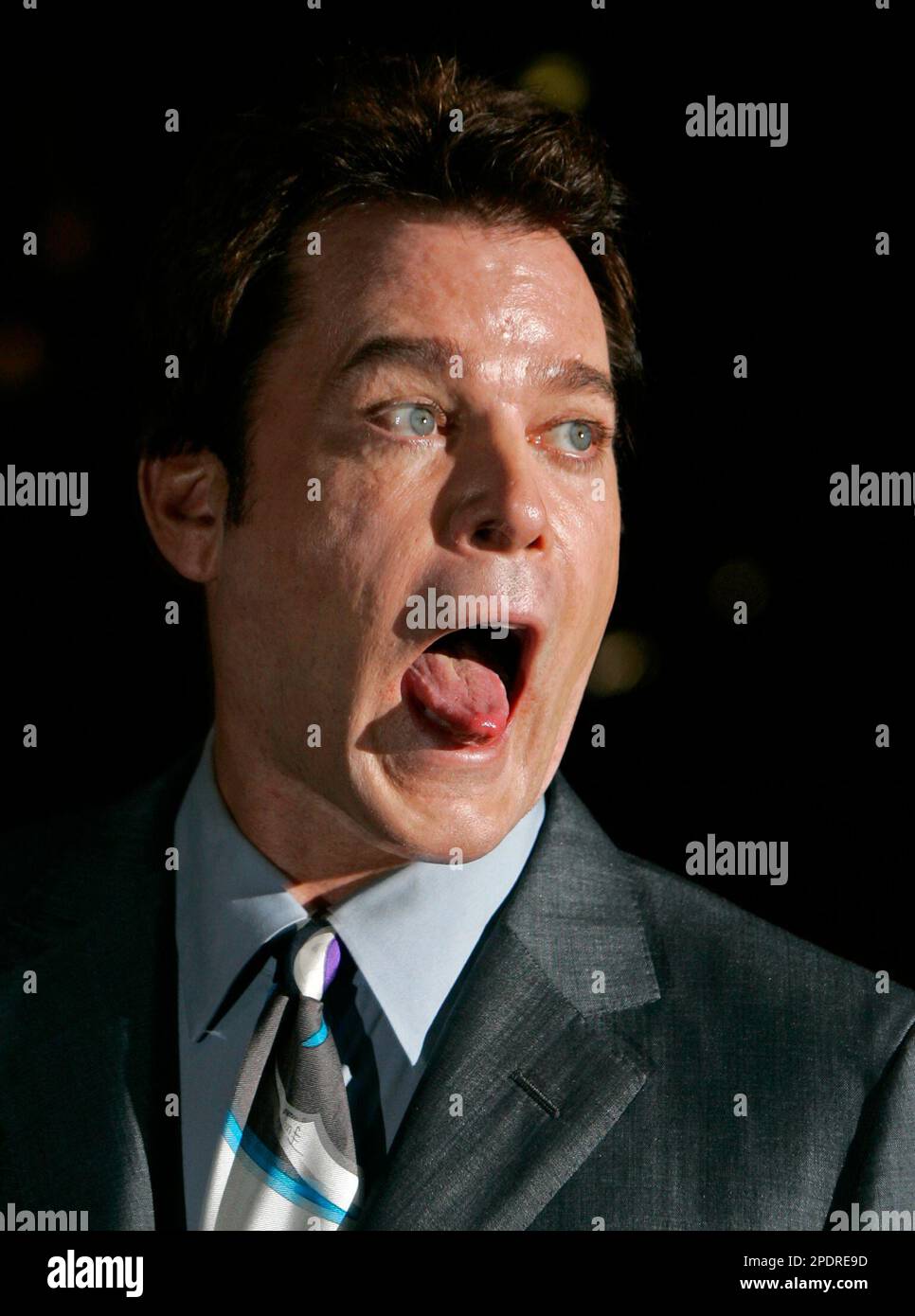 U.S. star Ray Liotta pulls a face at photographers as he arrives at the ...