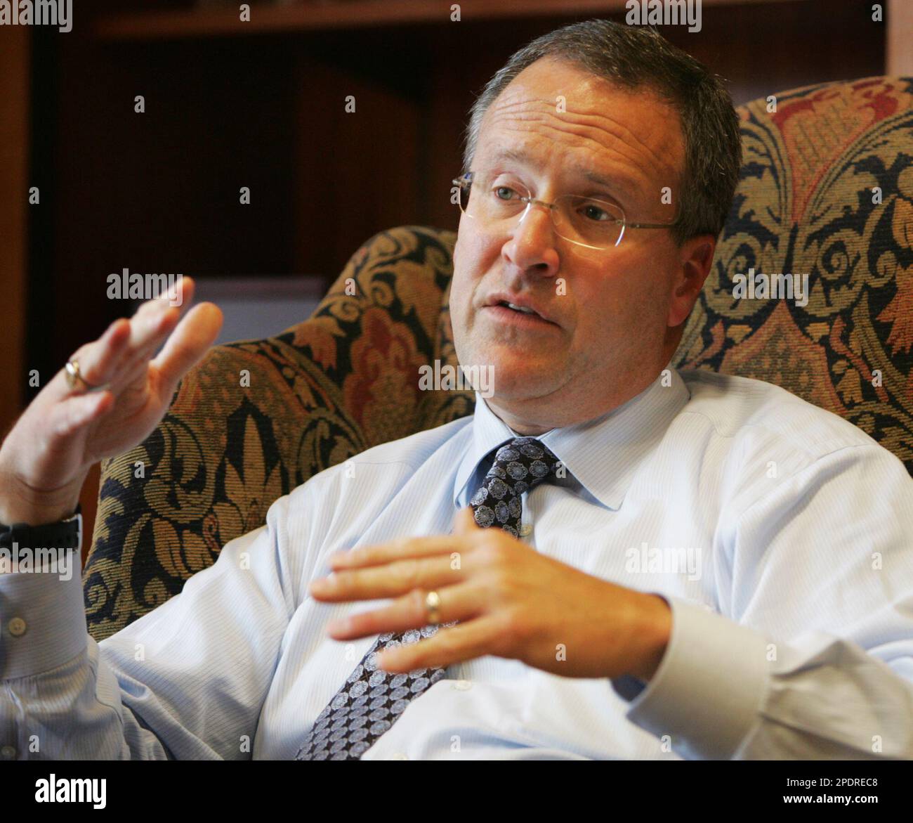 Long time Eli Lilly and Co. executive John C. Lechleiter talks with a reporter after being ...