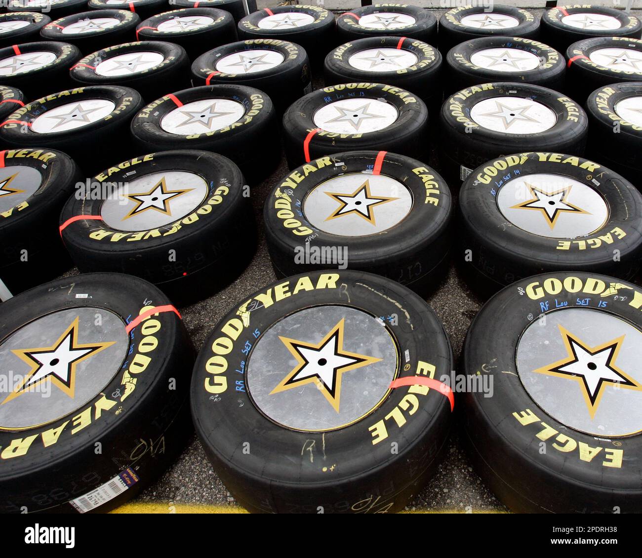Goodyear tires are seen behind the pit box of the US Army Chevrolet ...