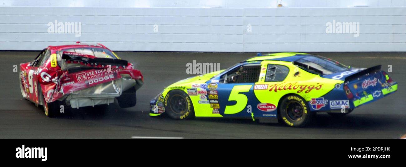 Kasey Kahne pulls in front of Kyle Busch during the NASCAR Sylvania 300 ...