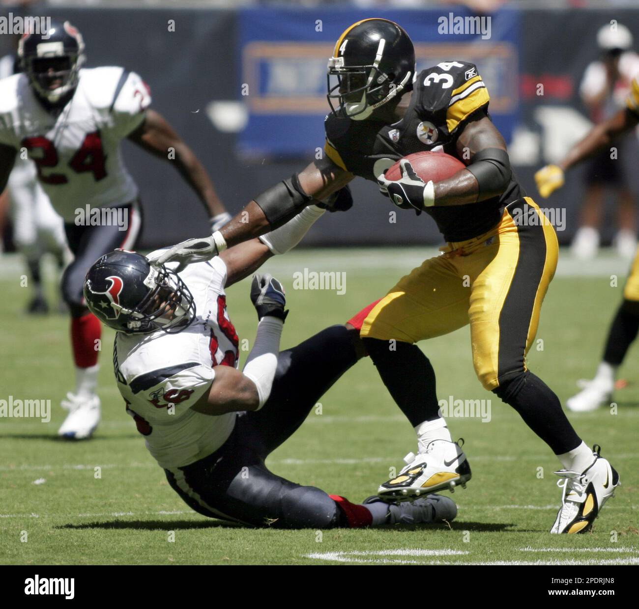 Pittsburgh Steelers running back Verron Haynes (34) pushes off Houston ...